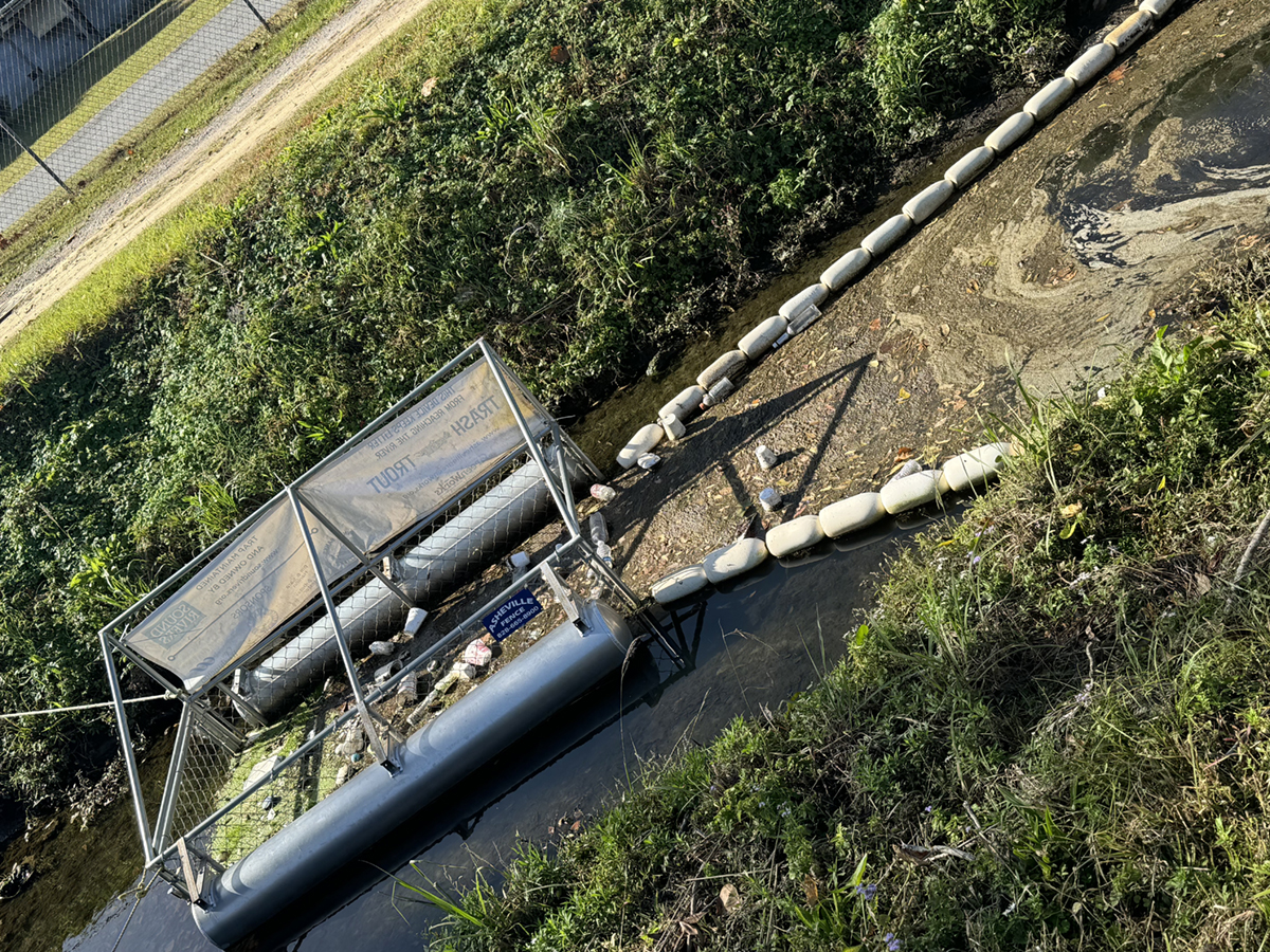 Trash trap cleanout nets 20 pounds of litter - Sound Rivers